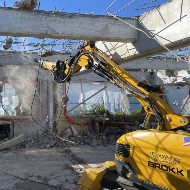 Gould Island Building Demo with Brokk | EnviroVantage | Abatement and ...